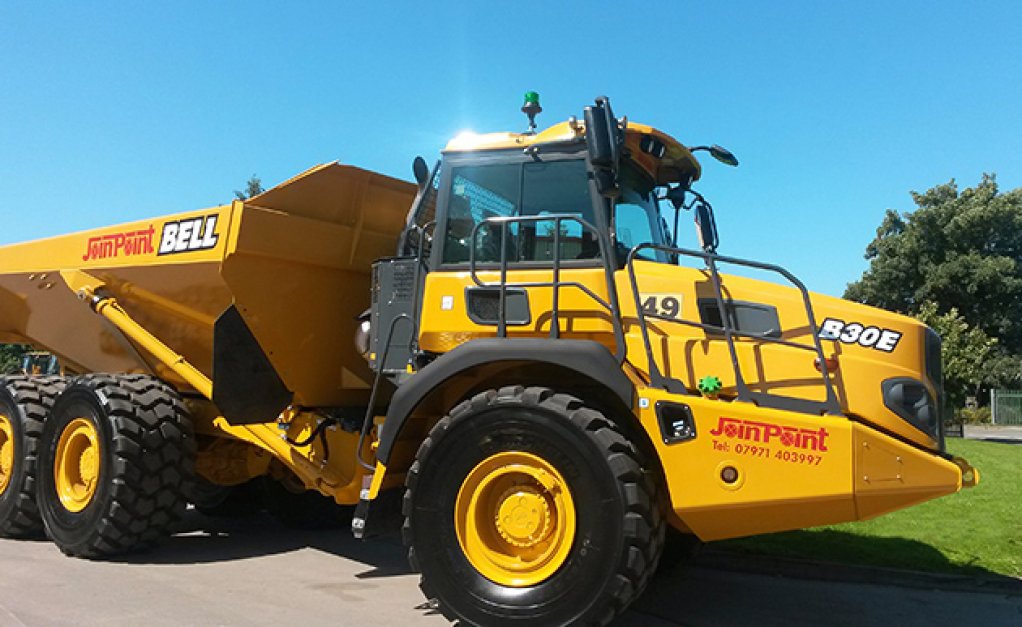 Company purchases 18 dump trucks for construction purposes