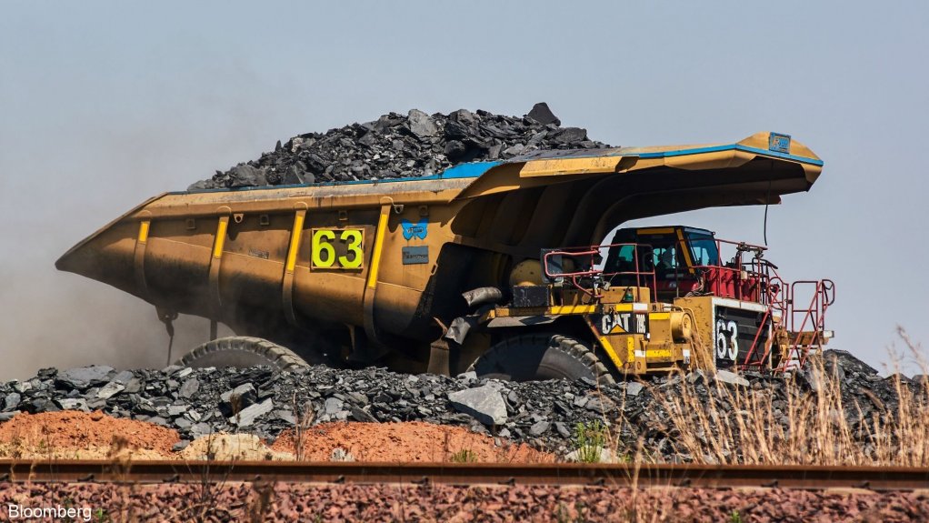 Two giant miners warn of tougher times as world demand wavers