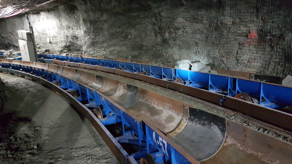 Rail haulage conveyor system benefits gold mine